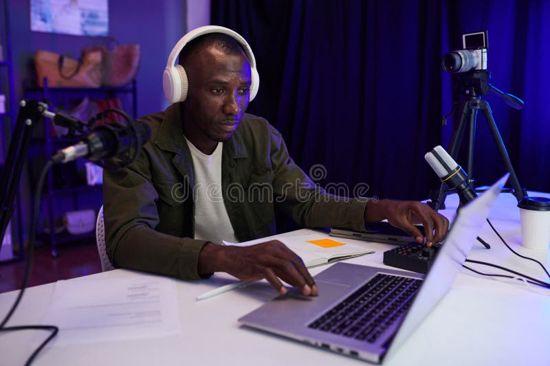 Podcaster Editing Sound stock image. Image of microphone - 283412809