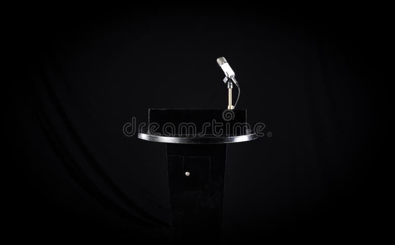 Podium Rostrum with a Microphone on Black Background Stock Photo ...