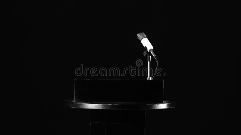 Podium Rostrum with a Microphone on Black Background Stock Image ...