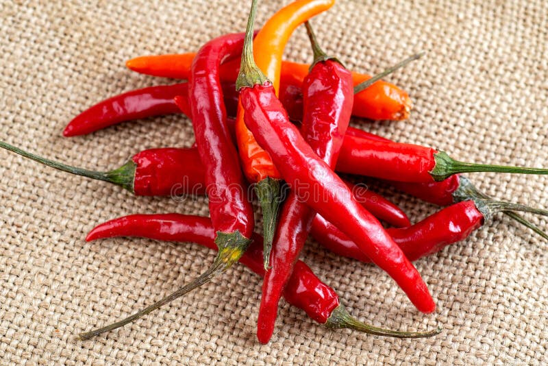 Pods of Red Hot Chili Peppers on Burlap. Space for Text Stock Photo ...