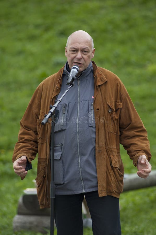 Poet G.Boyko read a poem editorial stock image. Image of grass - 26958539