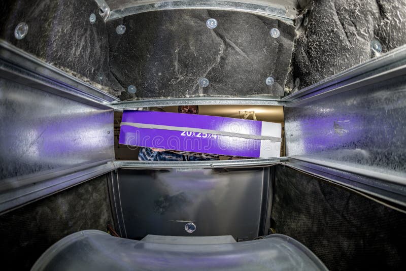 Point of View from Inside a Furnace As a Man Inserts a New Clean Filter ...