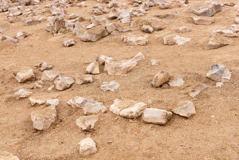 Pointed stones on sand stock image. Image of brick, ground - 121677339