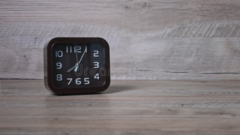 Male Hand Puts an Arrow Mechanical Watch on a Wooden Table Stock ...