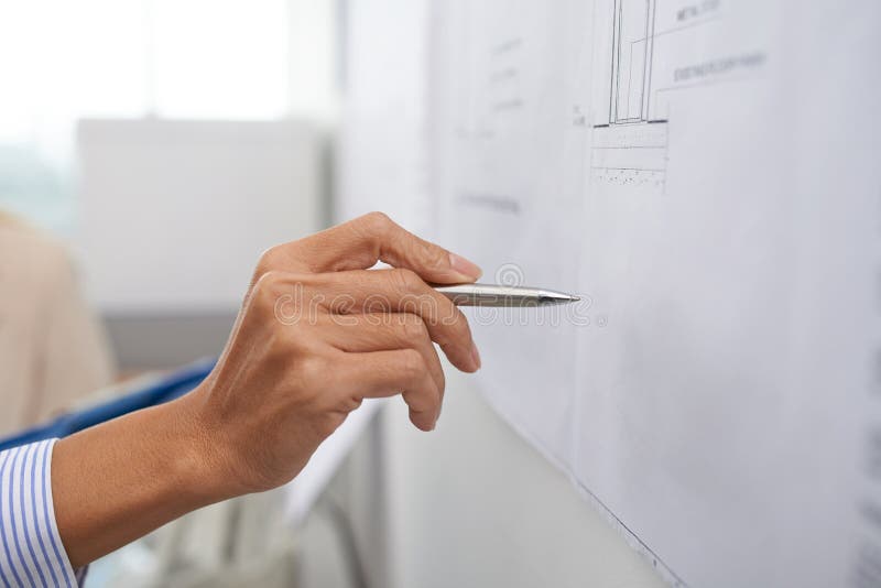 Pointing at the blueprint stock photo. Image of closeup - 58246050