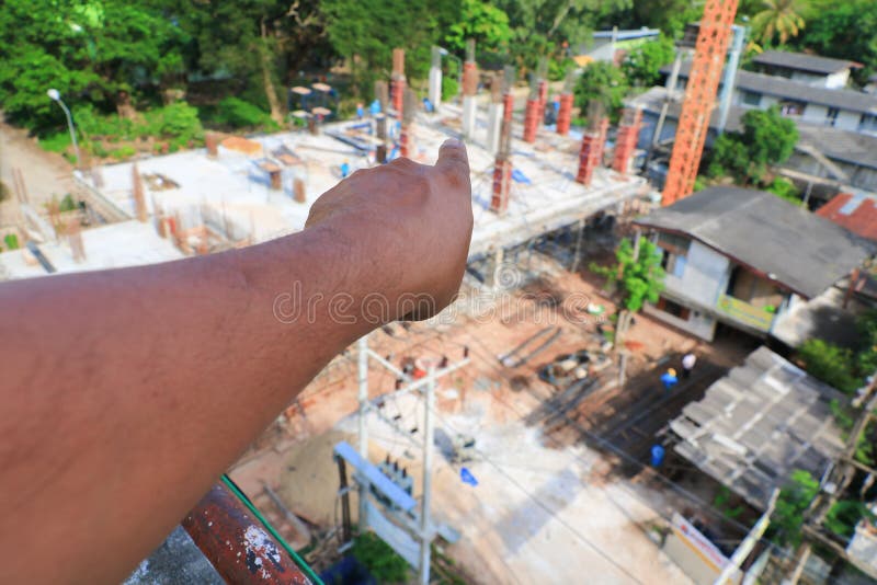 Pointing at a Building Under Construction Stock Image - Image of ...