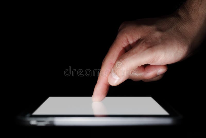 Stock Photo of a Woman`s Hand Writing on a Tablet in the Dark Stock ...