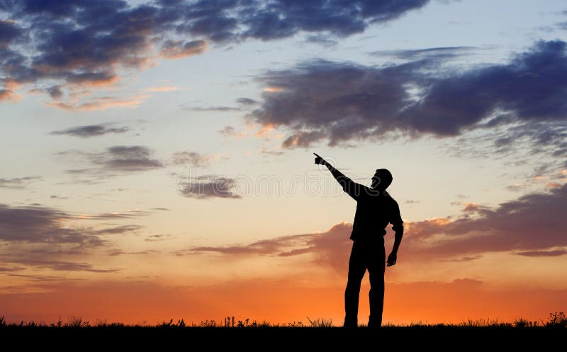 Silhouette of Man Pointing Finger in Air at Sunset Stock Image - Image ...