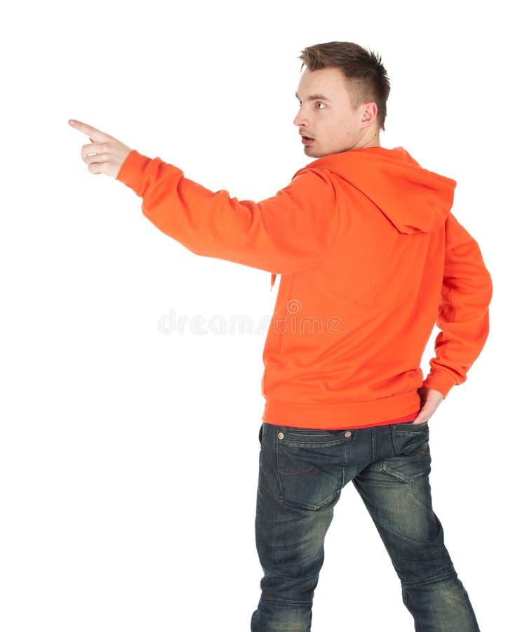 Pointing Young Man in Orange Sweatshirt Stock Photo - Image of fashion ...