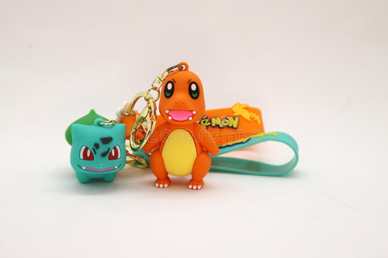 Pokémon Keychains with the Characters Bulbasaur and Charmander on an ...
