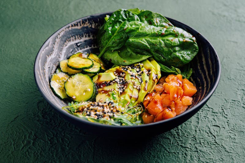 Poke Bowl with Salmon, Avocado and Cucumber Stock Image - Image of bowl ...