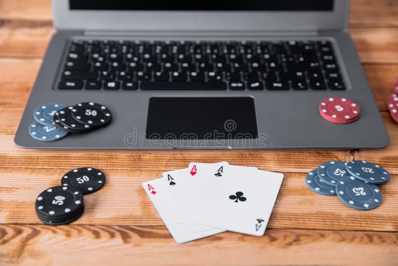 Poker Aces and Chips on Computer Laptop Stock Image - Image of casino ...