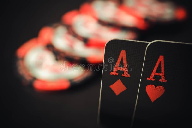 Poker Aces Pair and Stack of Chips on the Play Table. Stock Photo ...