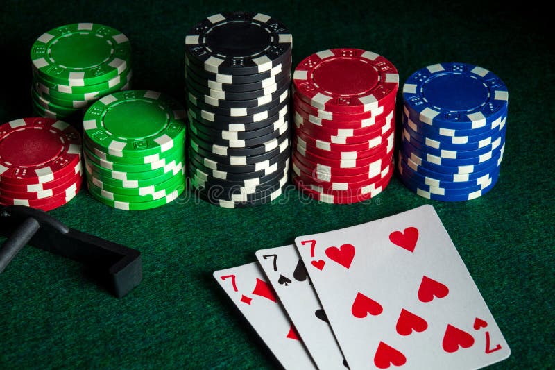 Poker Cards with Three of a Kind or Set Combination in Casino. Chips ...