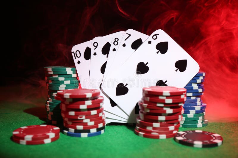 Poker Chips and Playing Cards on Green Table Stock Image - Image of ...
