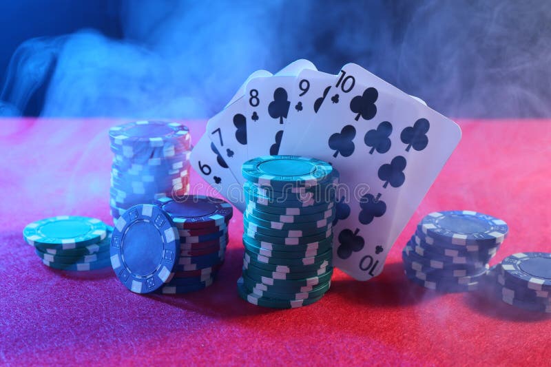 Poker Chips and Playing Cards on Pink Table Stock Image - Image of ...