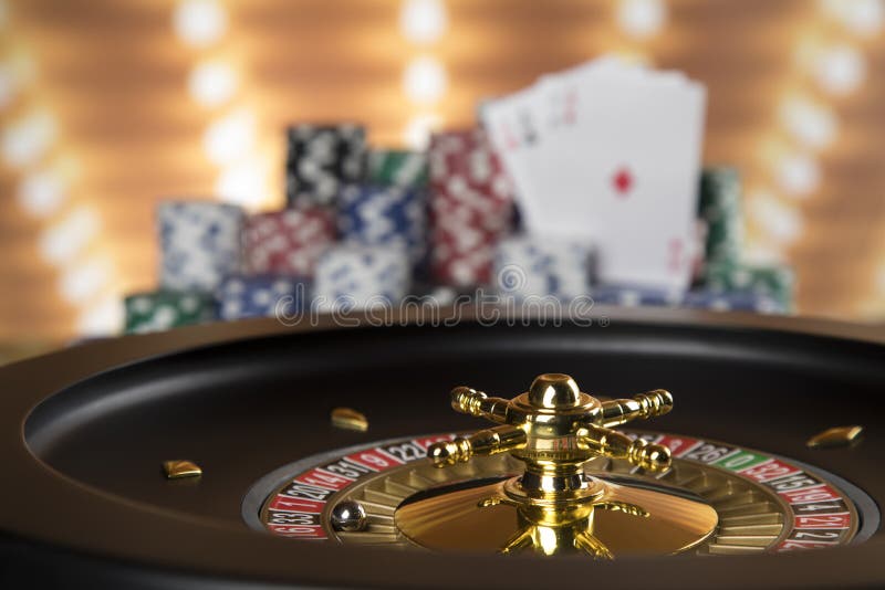 Poker Chips, Roulette Wheel in Motion, Casino Background Stock Image ...
