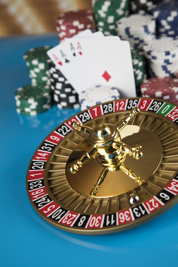 Poker Chips, Roulette Wheel in Motion, Casino Background Stock Image ...