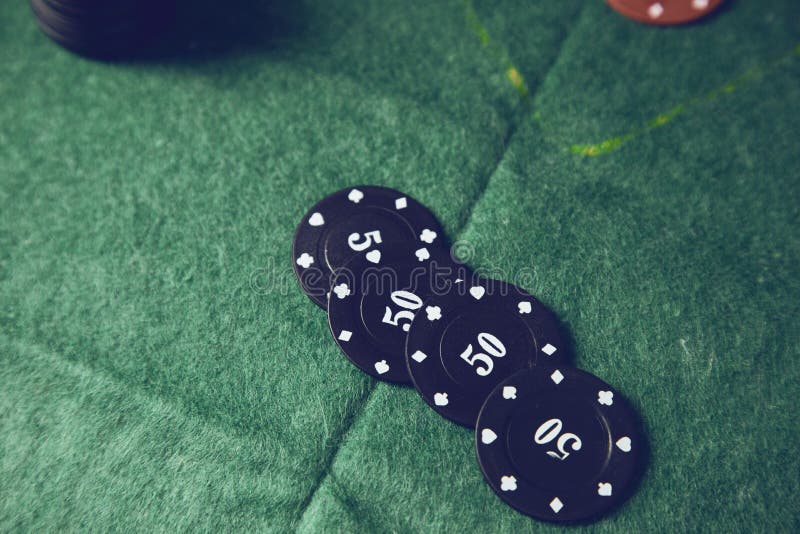 Poker chips stack on table stock image. Image of table - 267660393