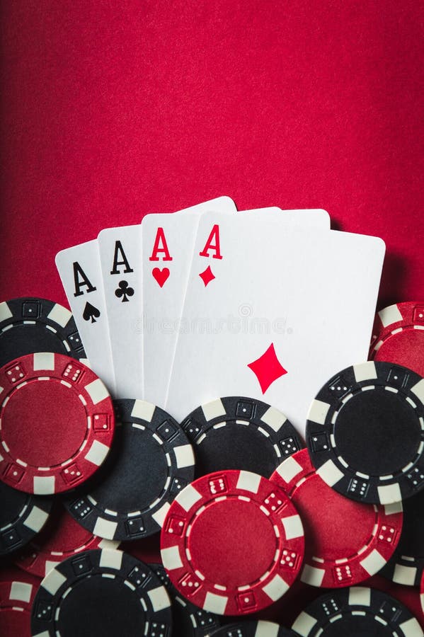 Poker Game with a Four of a Kind or Quads Hand. Chips and Cards on the ...