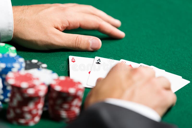 Poker Player Opens His Poker Cards Stock Image - Image of green, chance ...