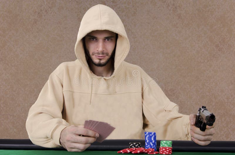 Poker player pointing gun stock image. Image of male - 28196429