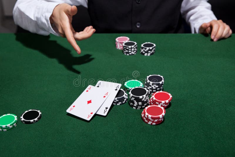 Poker Player Throwing Down a Pair of Aces Stock Image - Image of aces ...