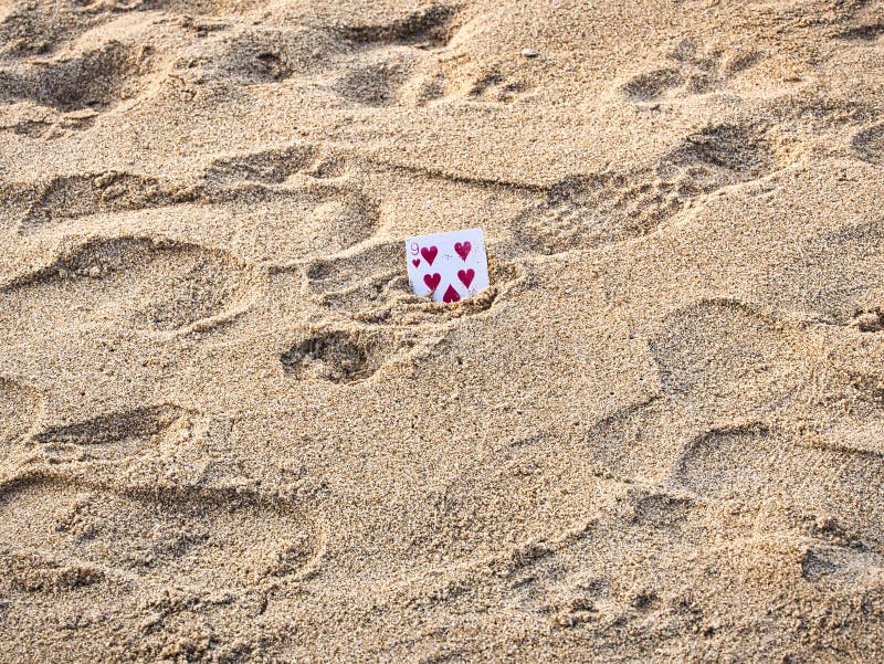 Poker Playing Cards Buried in a Sand Dune Stock Image - Image of coins ...