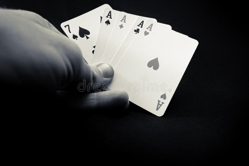 Poker Playing Cards Held in Hands with Aces Stock Photo - Image of ...