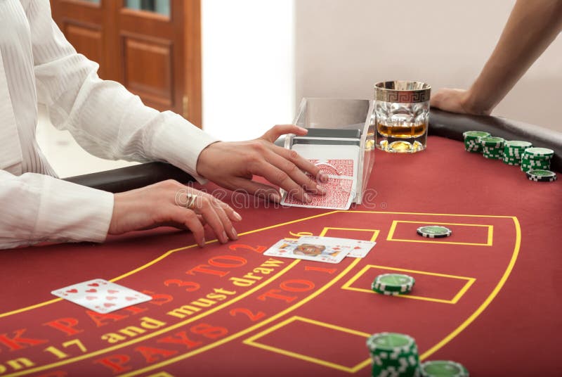 Croupier Shuffling Playing Cards at Poker Table Stock Photo - Image of ...