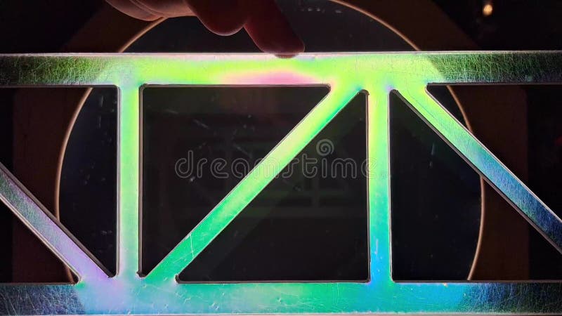 A Polarized Light Experiment Reveals Stress Patterns in a Plastic ...