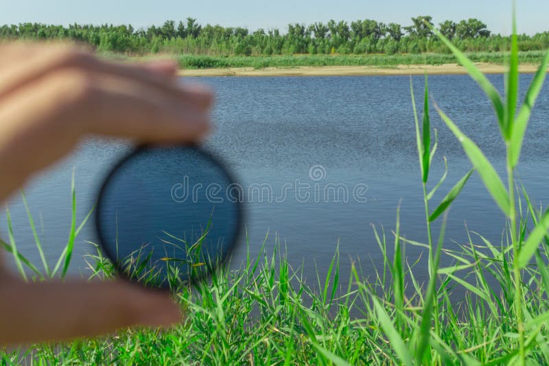 Polarizing Filter for the Camera Stock Image - Image of holding, lenses ...