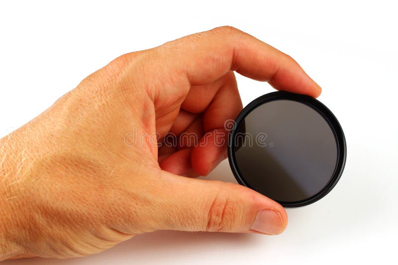 Polarizing Filter in Hand on a White Background Stock Image - Image of ...