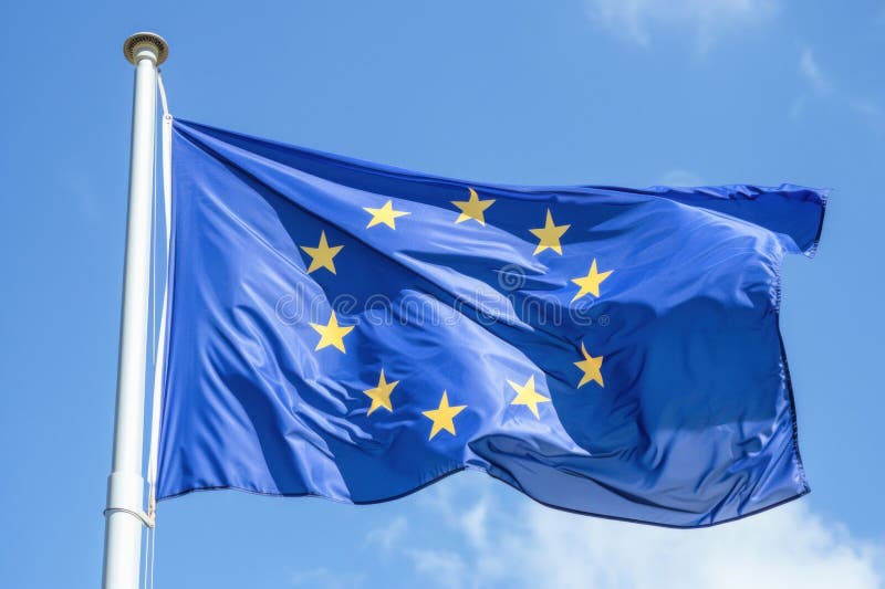 On a Pole, a Blue Rectangular Flag with Yellow Stars Waves in the Wind ...