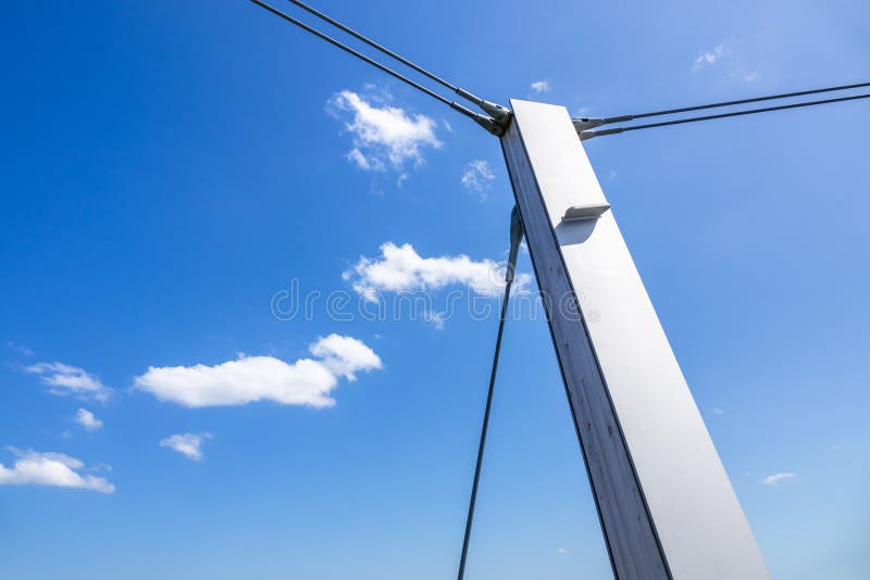 A Pole in Front of a Blue Sky Stock Image - Image of mast, building ...