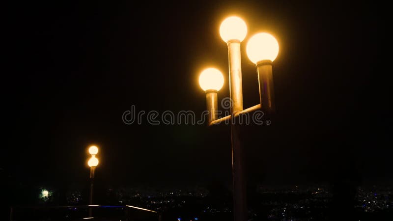Pole Lamp Lights at Night with Night Dark City in the Background Stock ...