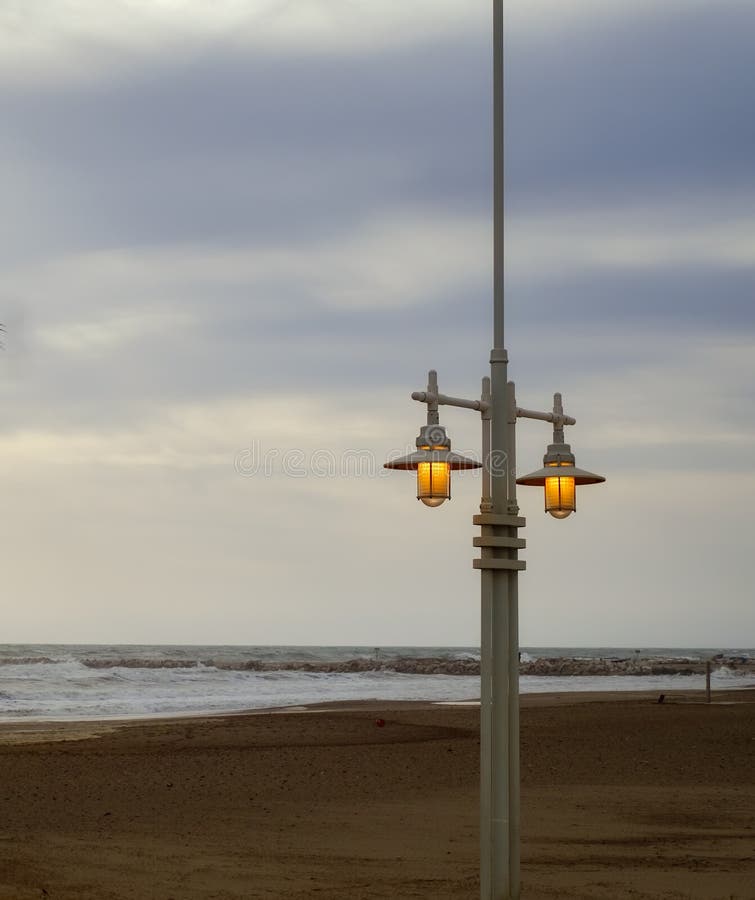 Lights pole on the beach stock photo. Image of palms - 108809782