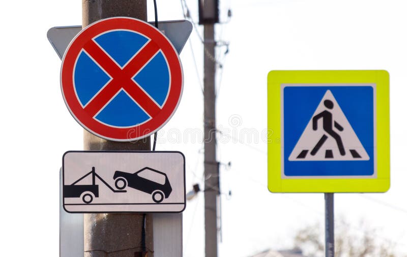 A Pole with a No Parking Sign and a No Left Turn Sign Stock Photo ...