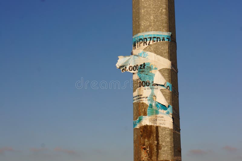 Pole poster editorial stock image. Image of poster, tearing - 48701374
