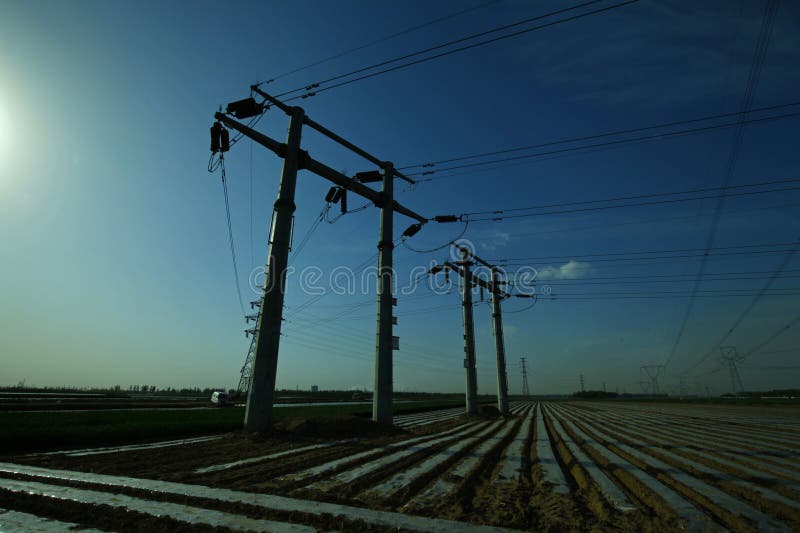 Pole and Tower of High Voltage Stock Photo - Image of line, spark ...