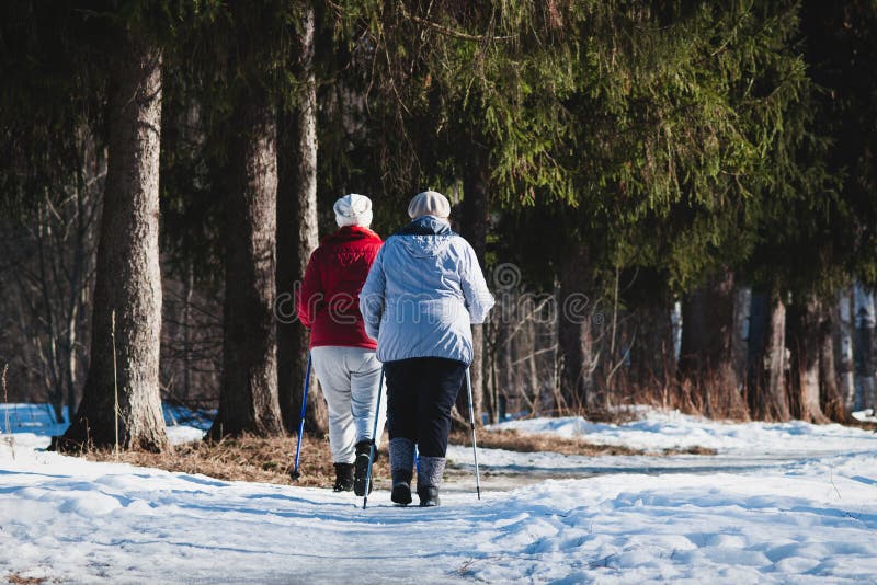 Daily Pole Walk in the City Park, Senior Women Exercise Early Spring ...