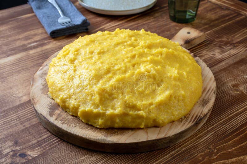 Polenta Cornmeal on Chopping Board Stock Image - Image of cornmeal ...