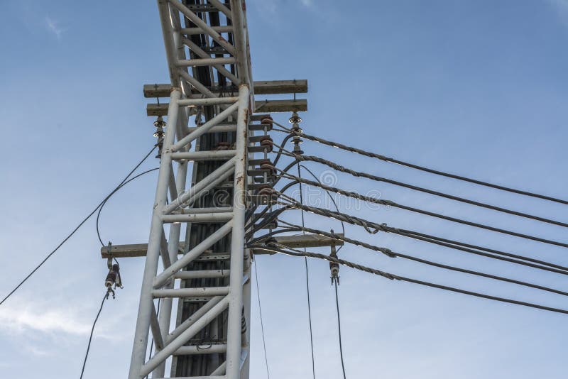 Poles of power lines stock image. Image of architecture - 58240693