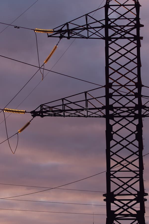 Poles at a Power Plant at Sunset As a Background Stock Image - Image of ...