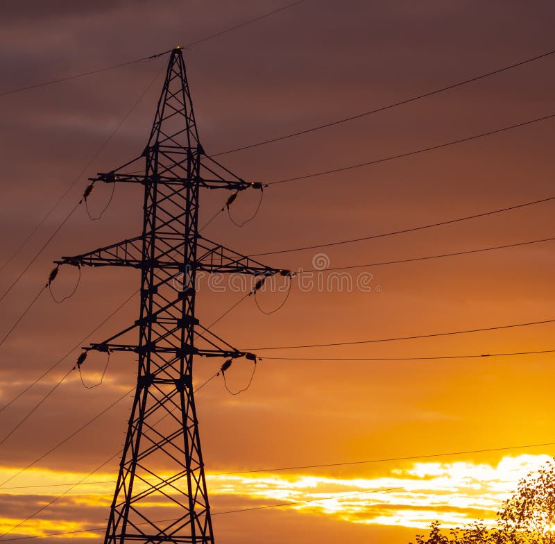 Poles at a Power Plant at Sunset As a Background Stock Photo - Image of ...