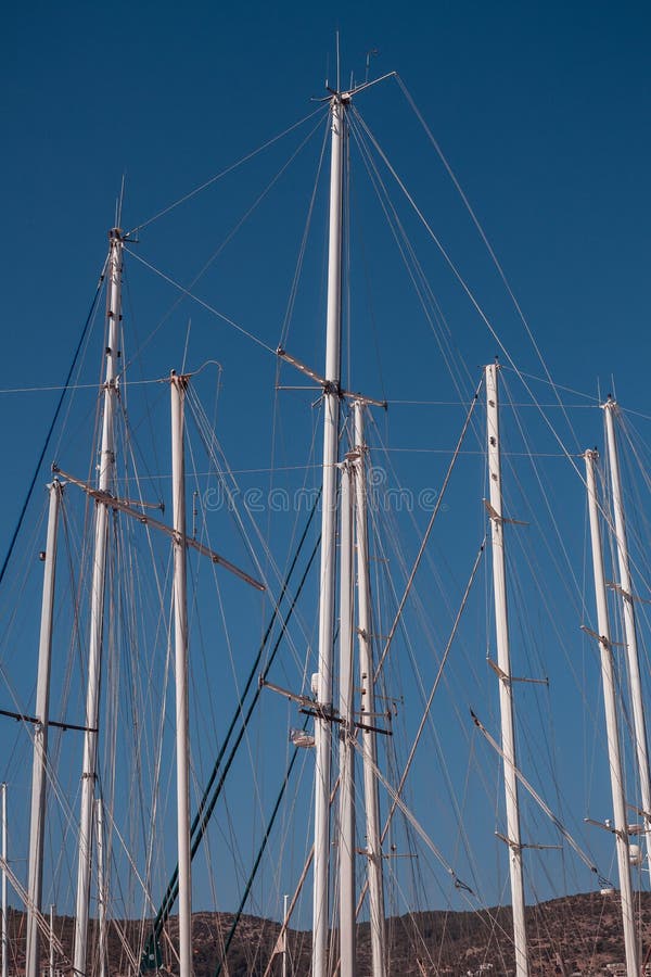 Poles of Sailing Yachts Against Blue Sky Background Stock Photo - Image ...