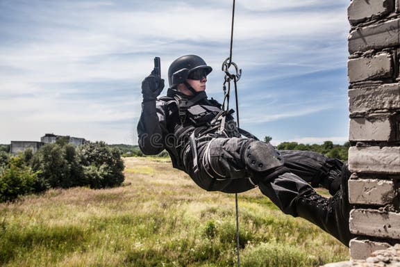 Police assault operation stock photo. Image of roping - 60974432
