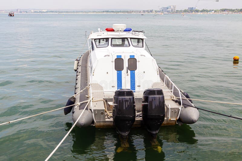 Police Boat with Two Engines Stands at the Marina Stock Photo - Image ...