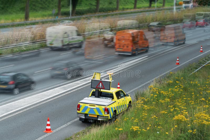 Police Car Directing Traffic on Highway. Selective Focus Stock Photo ...