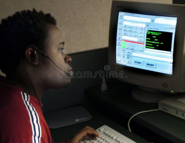 Police Dispatcher Using a Computer To Dispatch Units To Calls for Help ...